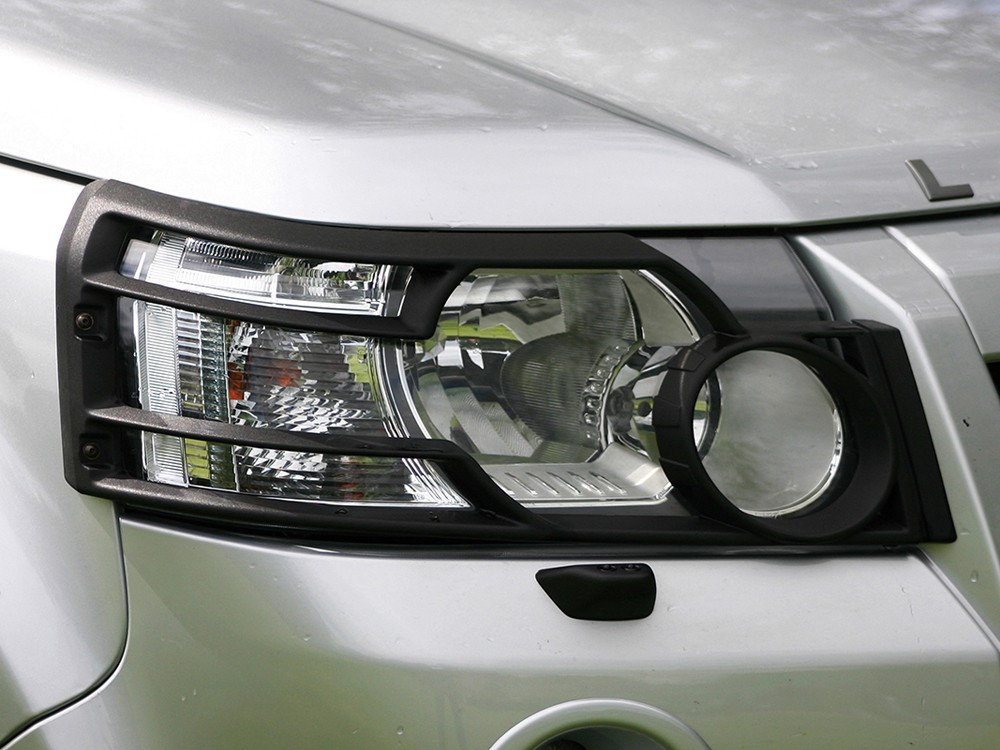 LR002408 - GUARD - HEADLAMP - Land Rover Parts